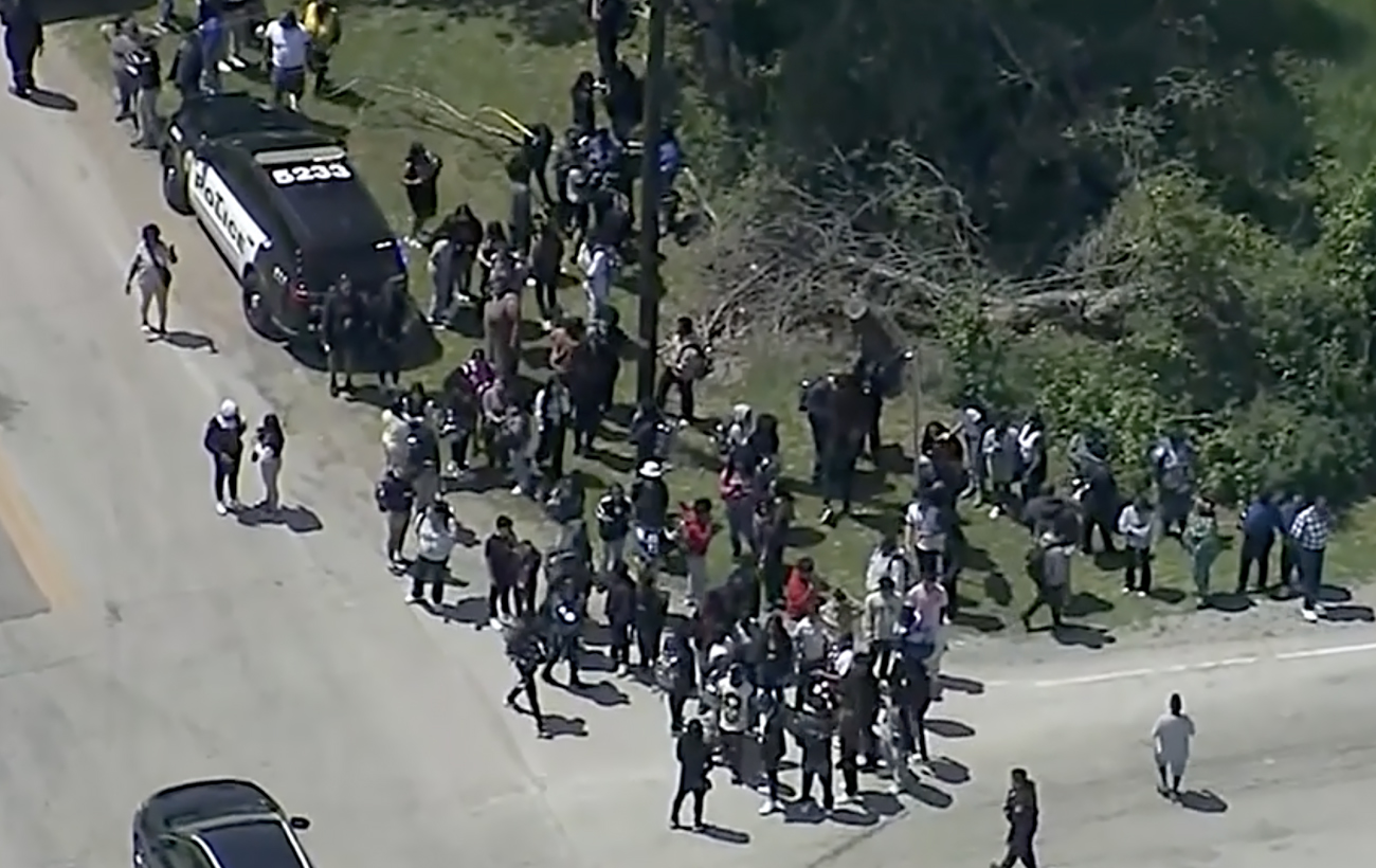 Dallas high school shooting leaves four injured as suspect taken into ...